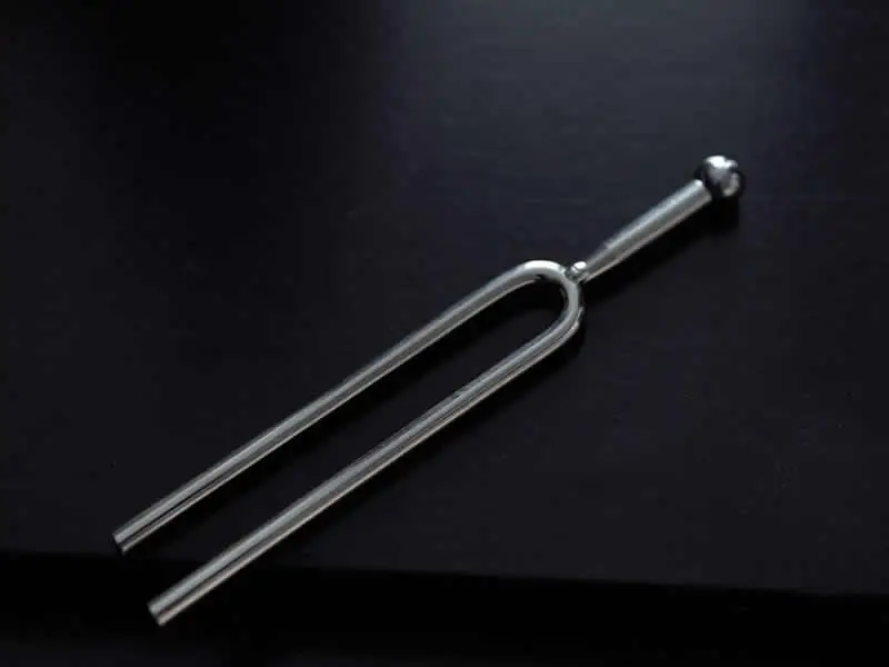 When a Tuning Fork Vibrates Over an Open Pipe